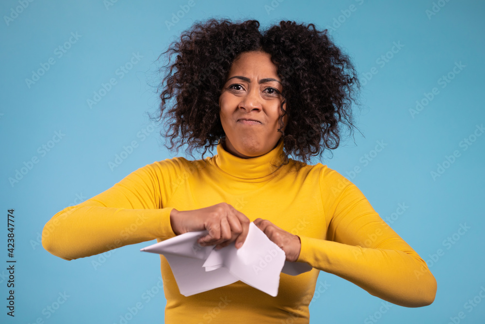 Angry woman tearing contract in pieces. Furious lady throwing crumpled ...