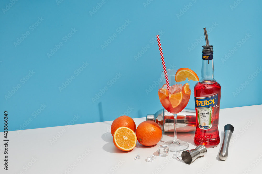 Cocktail Aperol spritz. Bottle of Aperol aperitivo, oranges and glass ...