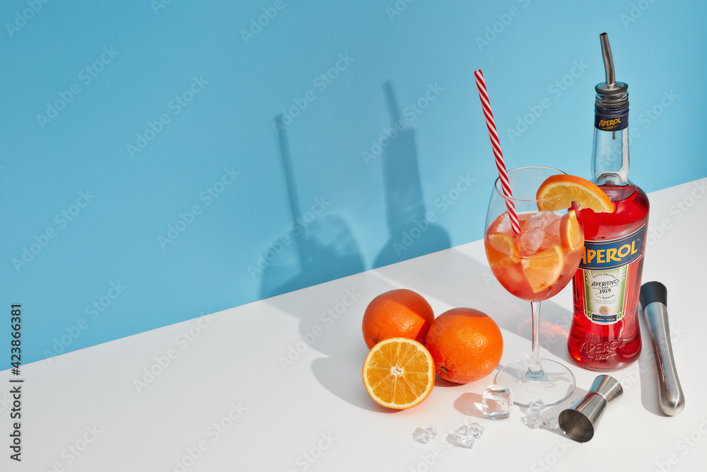 Cocktail Aperol spritz. Bottle of Aperol aperitivo, oranges and glass ...