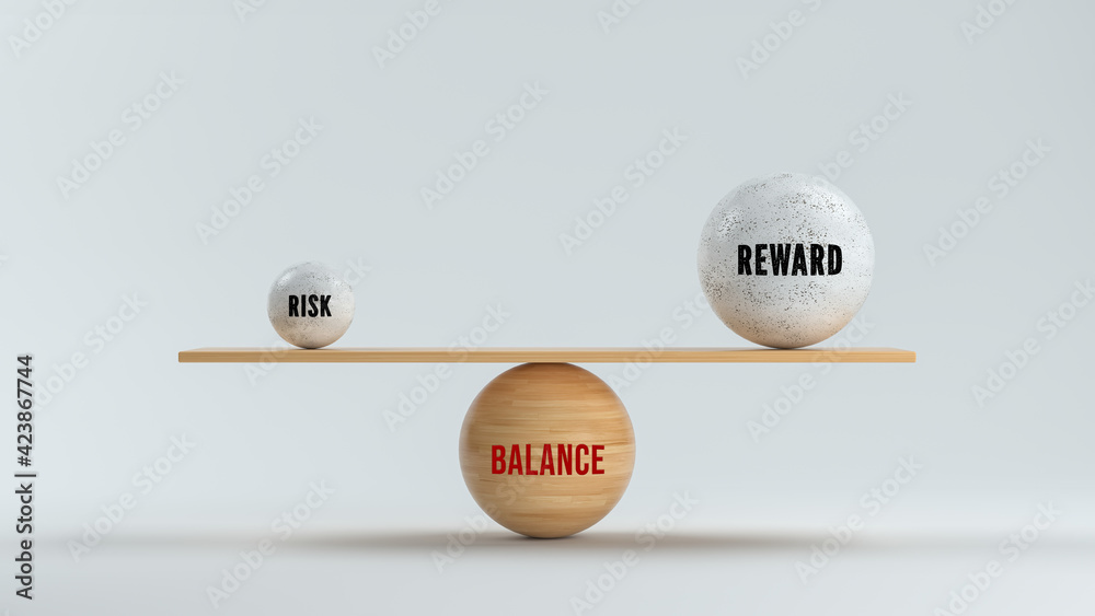 Concept of balancing Reward versus Risk in business and life with three ...