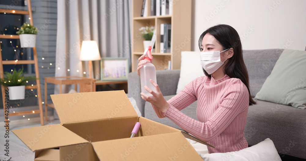 woman open online shopping parcel Stock Photo | Adobe Stock