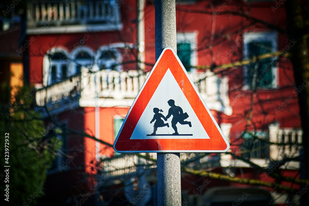 Attention children crossing the road traffic sign, school zone ahead ...