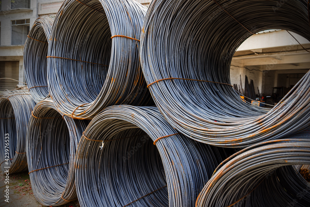 steel rebar for reinforcement concrete at construction site with house ...