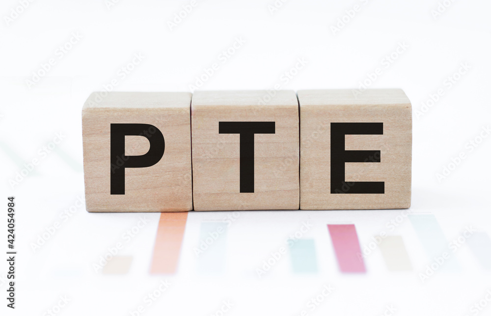 PTE - acronym from wooden blocks with letters, Pearson Tests of English ...