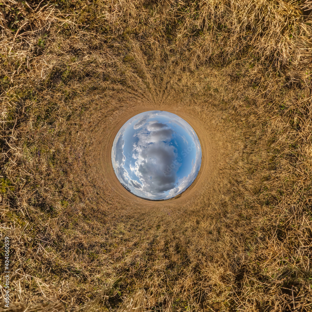 blue sky ball in middle of swirling field. Inversion of tiny planet ...