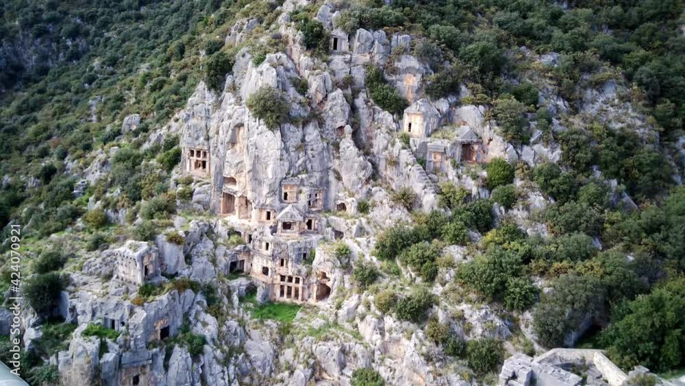 High angle drone aerial view of ancient greek rock cut lykian empire ...