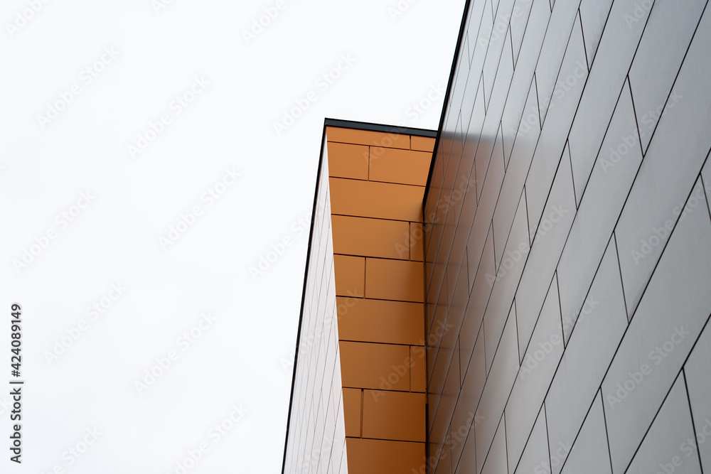 The exterior wall of a contemporary commercial style building with ...