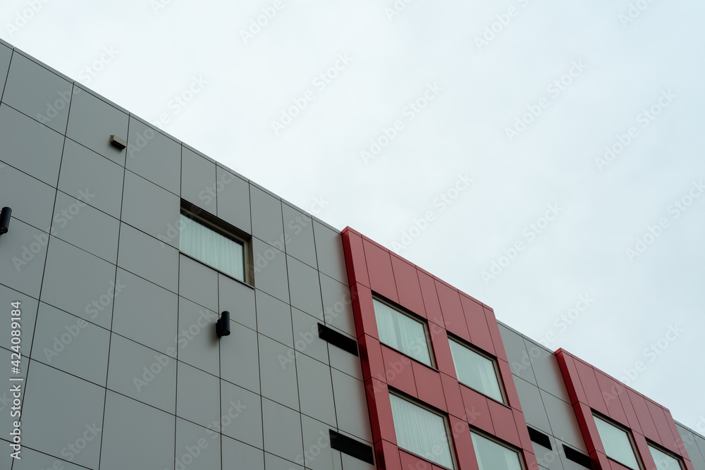 The exterior wall of a contemporary commercial style building with ...