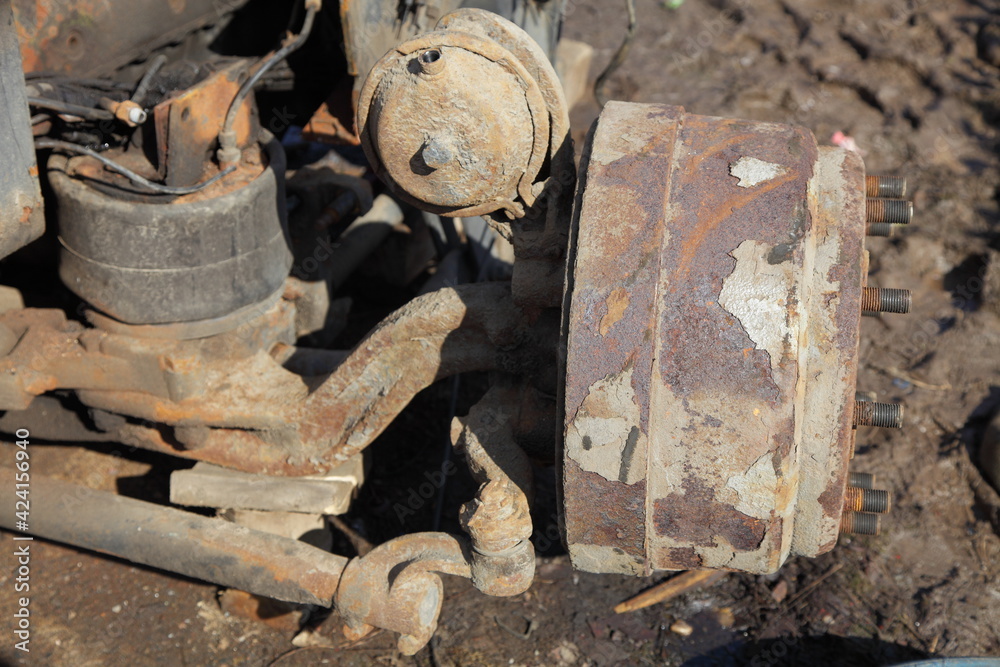 Old used heavy truck rusty front axle air suspension wuth brake drum ...