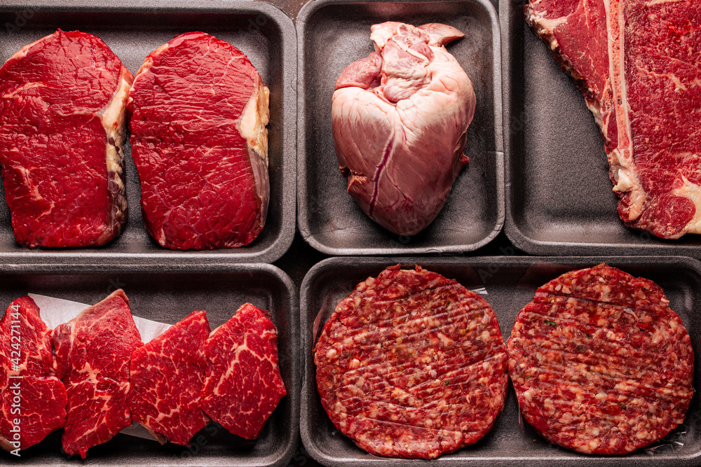 Foto de Black plastic packaging trays from supermarket with different ...