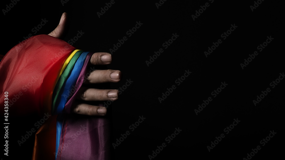 Flag of pride. LGBTQ flag and hand. Lesbian Gay Bi sexsual Transgender ...