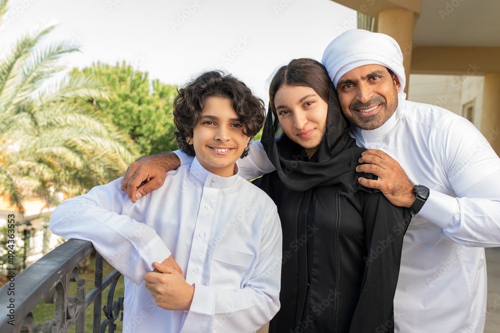 Arabian family of father, Brother, and daughter smiling Stock Photo ...