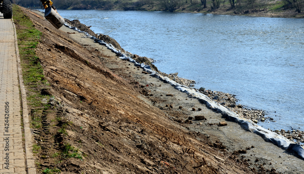 repair of the slope above the river, the river banks are strengthened ...
