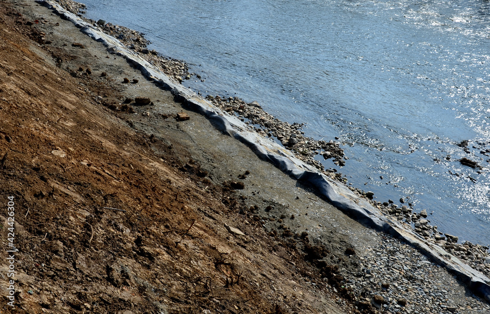 repair of the slope above the river, the river banks are strengthened ...