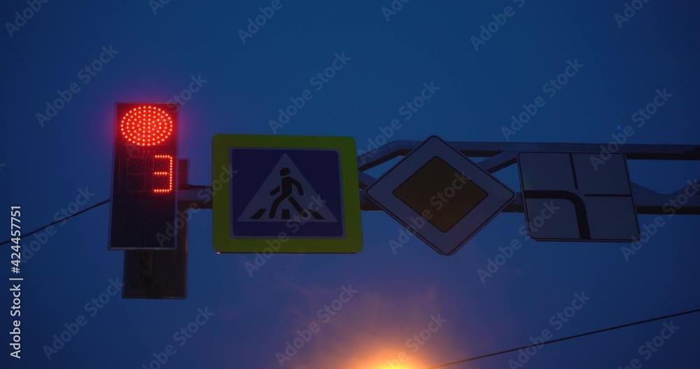 Traffic Signal at Night -- Stop and Go. Red and Green lights on a ...