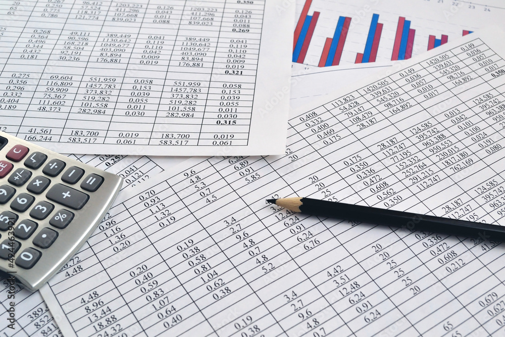 Photos of charts, diagrams and numbers showing the rise and fall in the ...