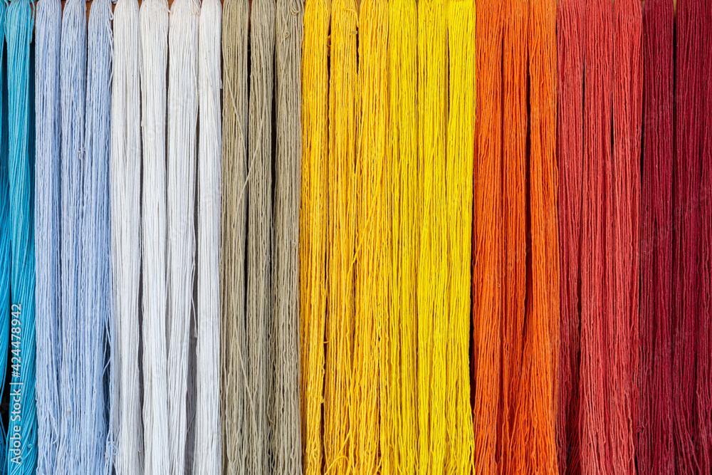 Yarn dyed thread or cord or packthread color hang on the wall for ...
