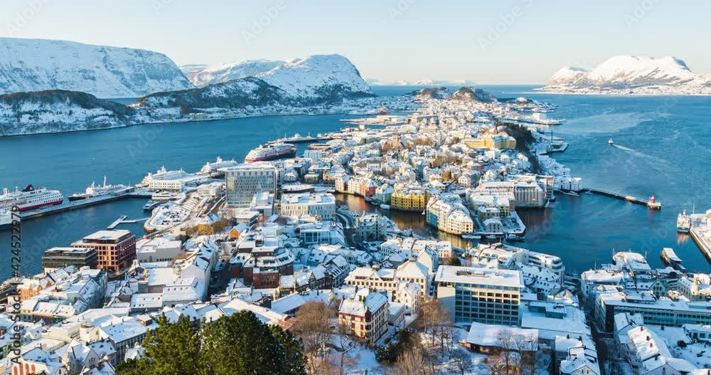 Faster, wider zoom-out time lapse of winter wonderland Alesund, Norway ...