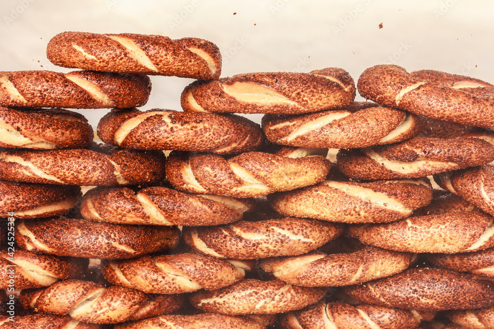 Heap of Turkish simits. Fresh simit on the street. Turkish sesame ...
