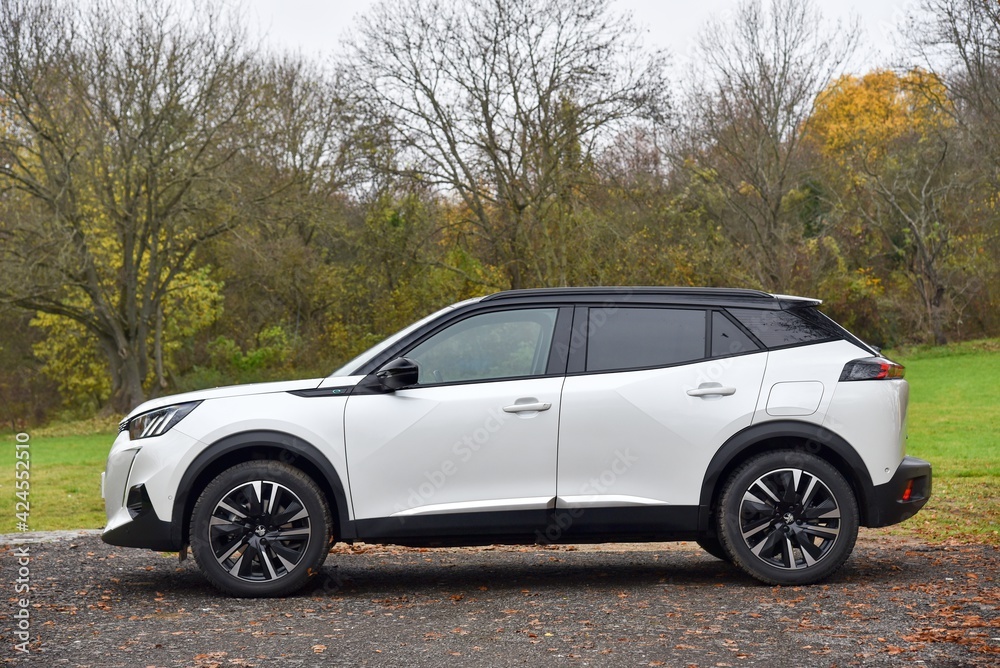 Peugeot e-2008. Electric car. Side view of a car. 11-15-2020, Prague ...