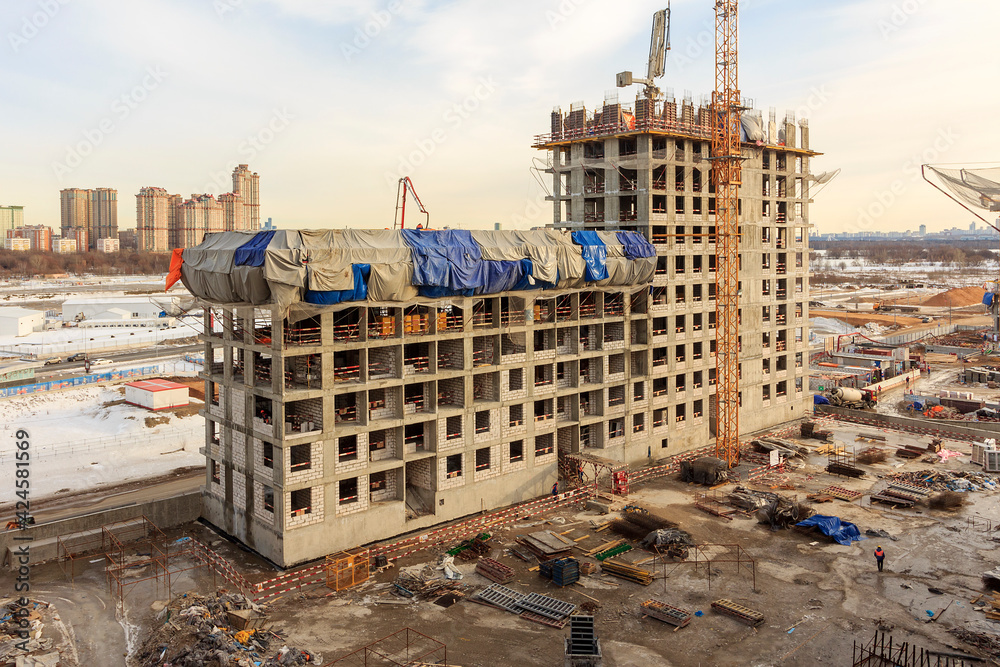 Construction site. Hoisting cranes. new multi-storey buildings ...