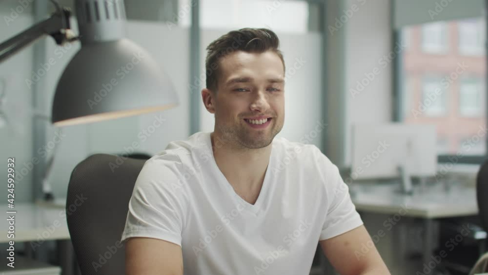 A handsome, sweet young man with a snow-white smile looks good ...