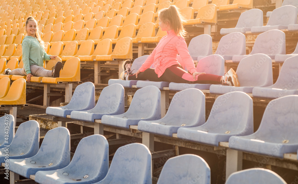 Leg Stretches Teenage Girls Do Splits On Stadium Seats Stretching