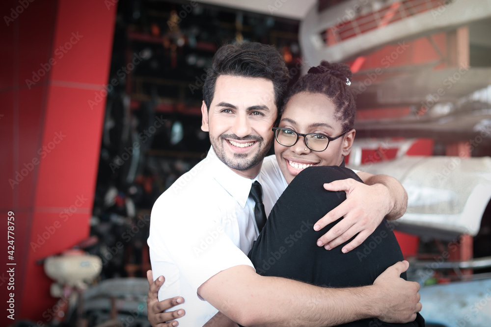 Fotka „Happy Harmony people at workplace, smiling white man and African ...