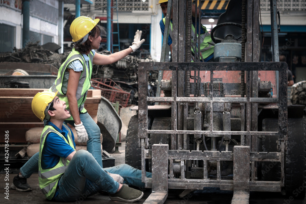 Accident at workplace, industrial engineer worker wearing helmet hit by ...