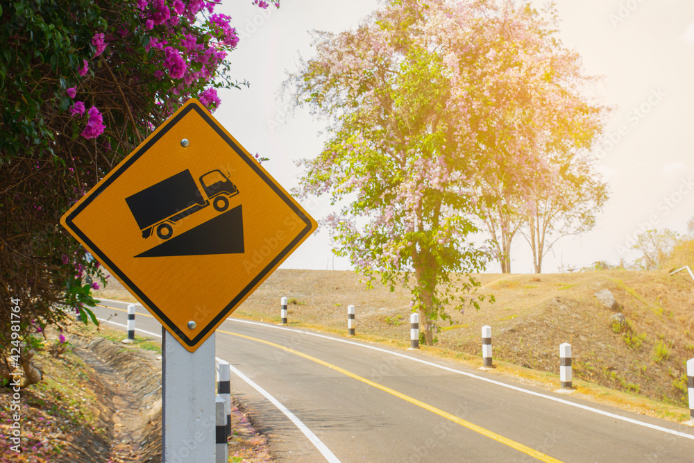 Traffic warning signs, the car is going up a steep slope. Stock Photo ...