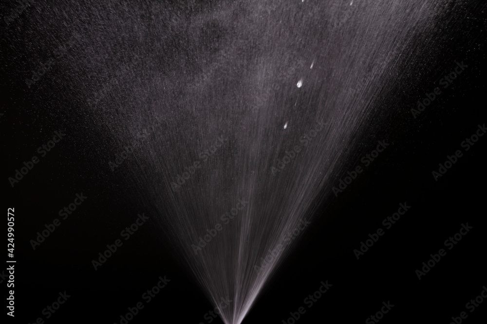 Stage dust particles in light shape isolated on black. Smoke through ...