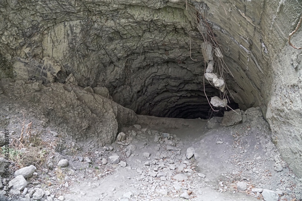 Mudslide destroyed tunnel and road. Natural disaster in mountains in ...