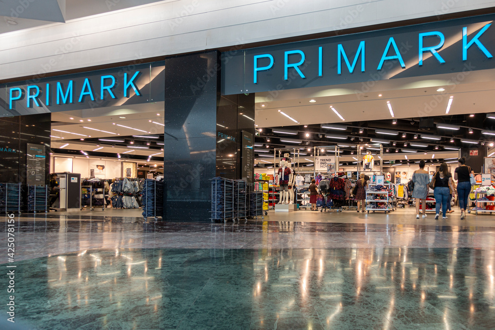 Entrance to the Primark store in shopping centre and Primark logo sign ...