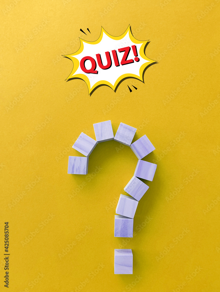 Quiz time concept, question mark with wooden blocks on yellow ...