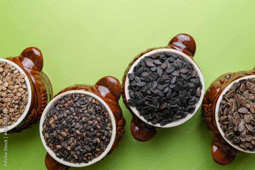 Watermelon seeds.Various varieties of watermelon seeds on a green ...