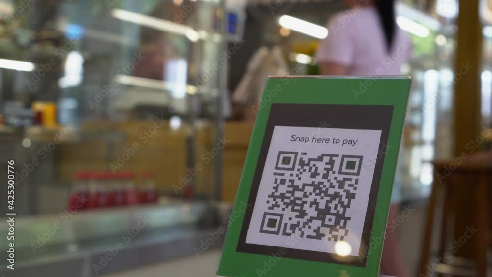 Video Stock QR code touch-free payment display in the restaurant. To ...