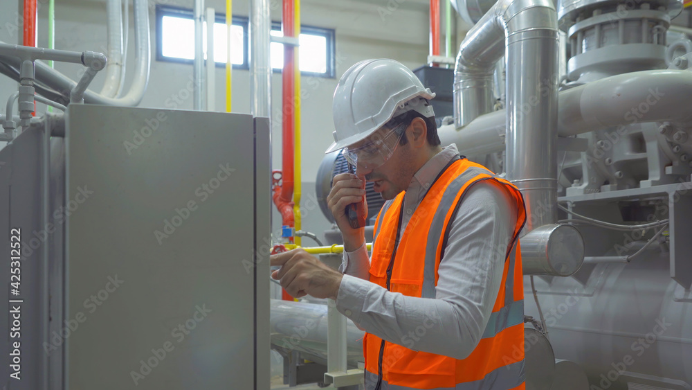 An engineer man or worker, people working in industry factory. Chiller ...