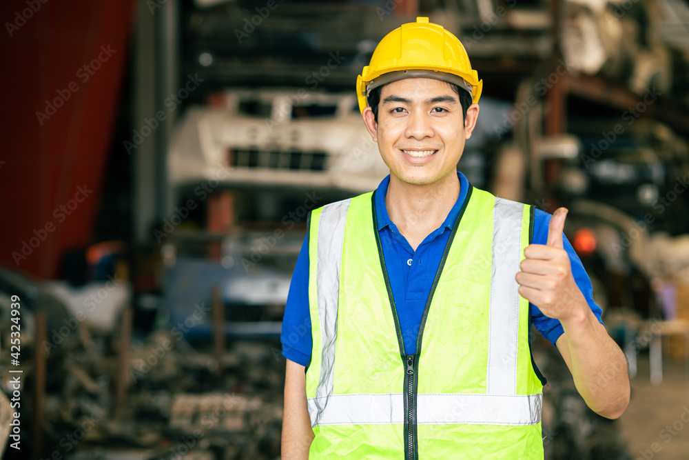 Happy worker Asian male man with safety suit work in engineering ...