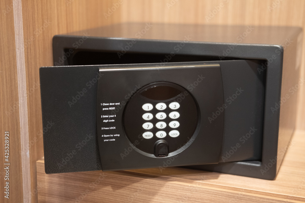 Safe box in a hotel room closet Stock Photo | Adobe Stock