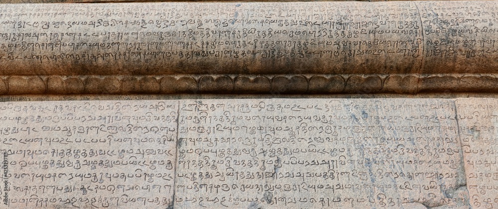 Inscriptions of Tamil language carved on the stone walls at ...