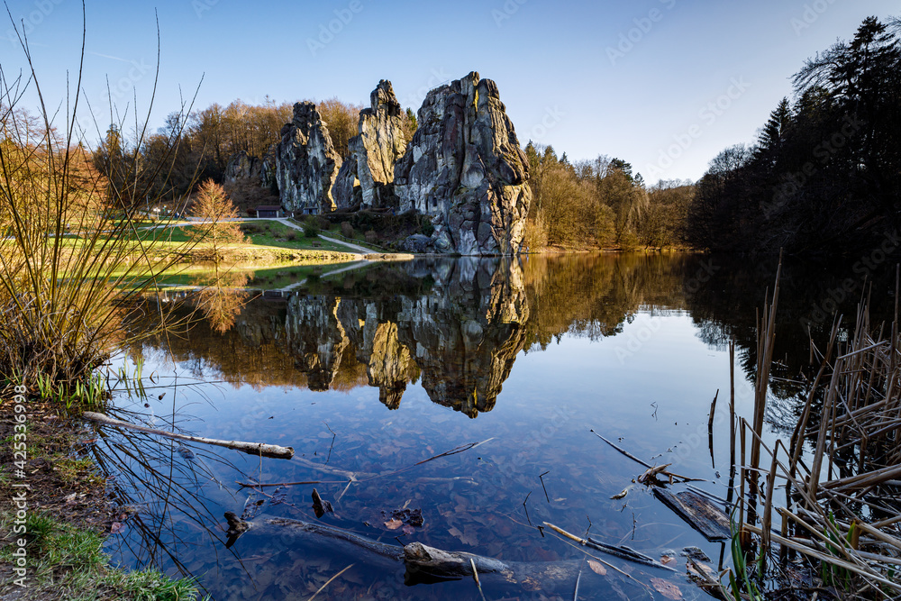 The Externsteine rock formation in the Teutoburg Forest in Germany ...