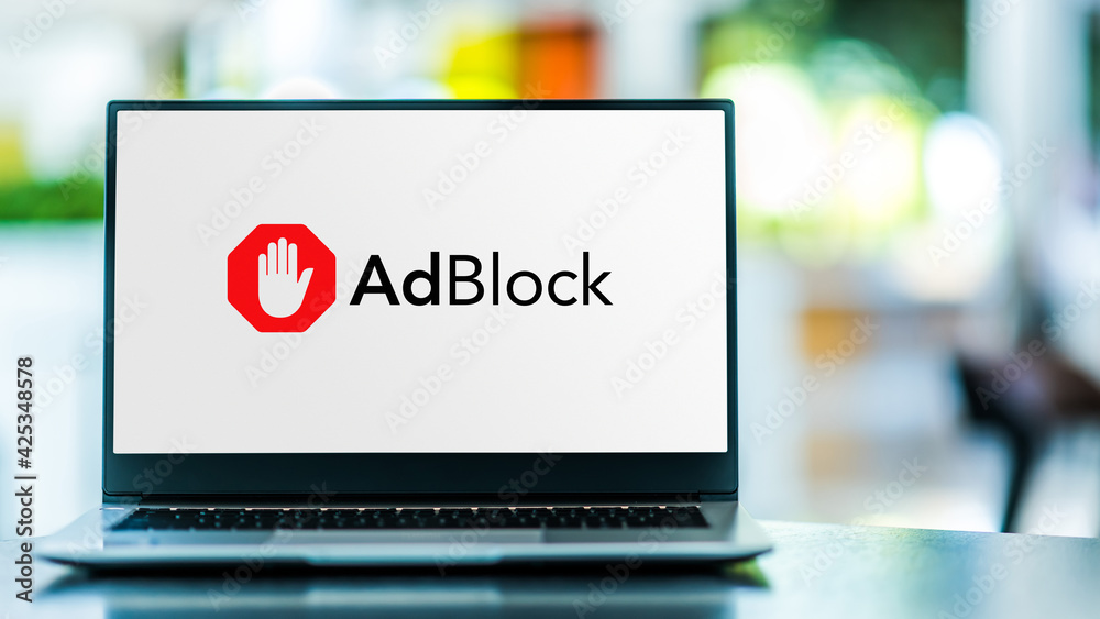 Laptop computer displaying logo of AdBlock Stock Photo | Adobe Stock