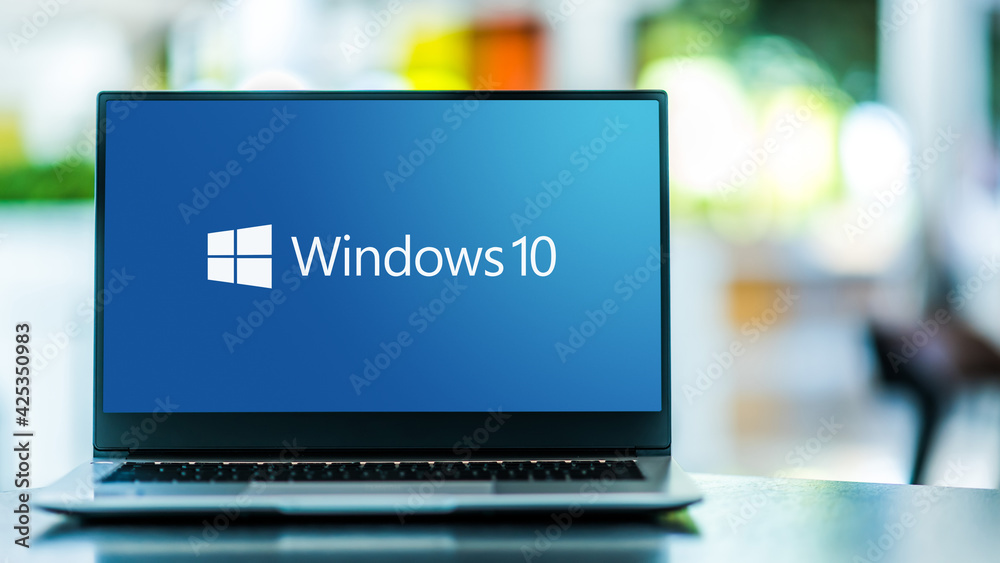 Laptop computer displaying logo of Windows 10 Stock Photo | Adobe Stock