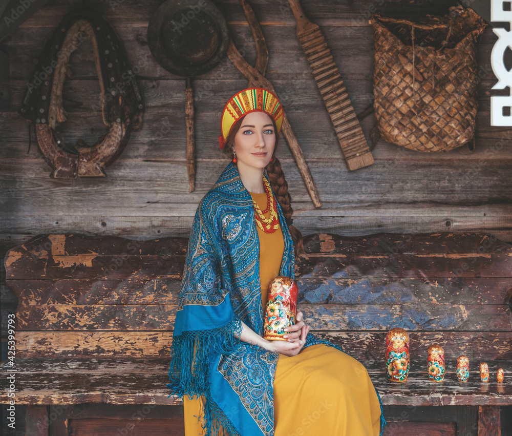 Russian beauty closeup on the traditional background with different ...