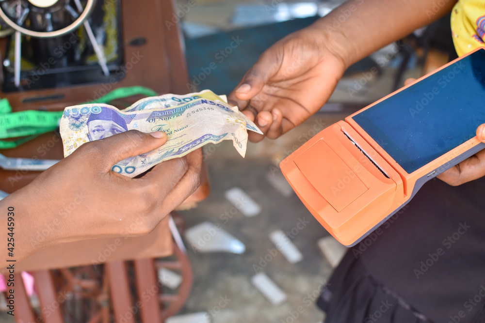Foto de Point of sales known as POS terminal device used for cash naira ...