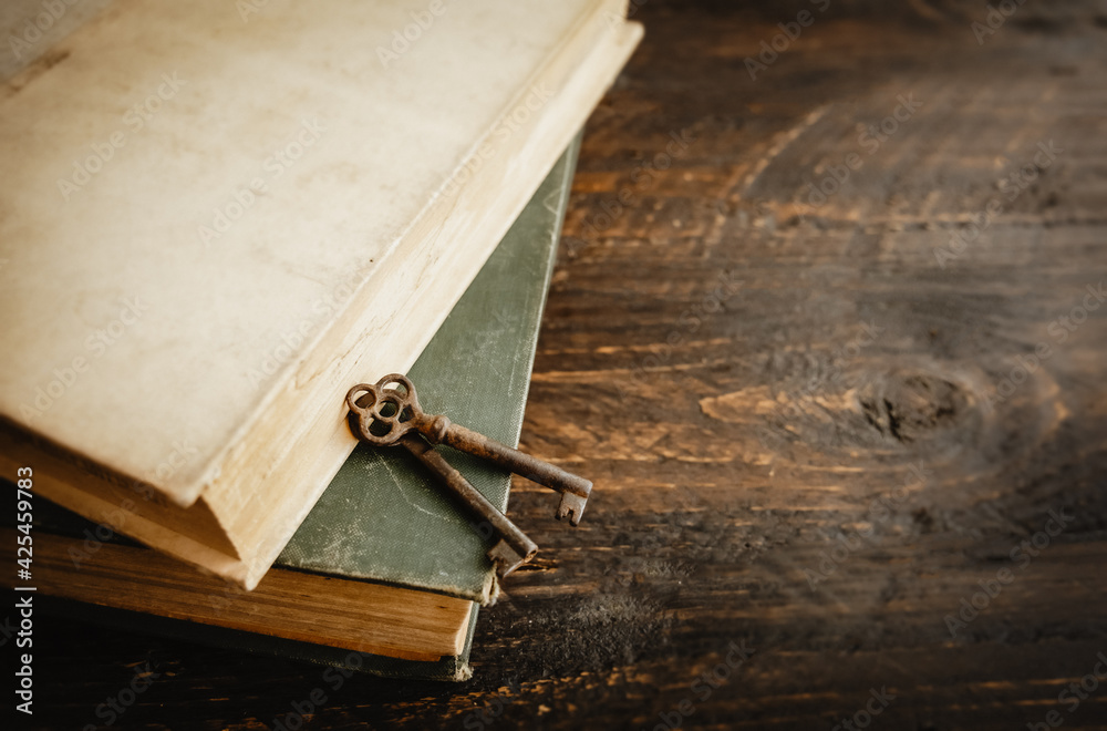 Old books and vintage keys. Books are the key to opening the doors of ...