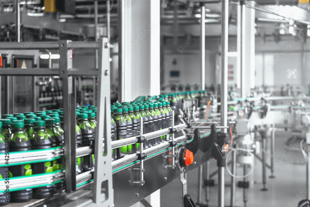 Industrial beverage factory interior with automated computerized ...