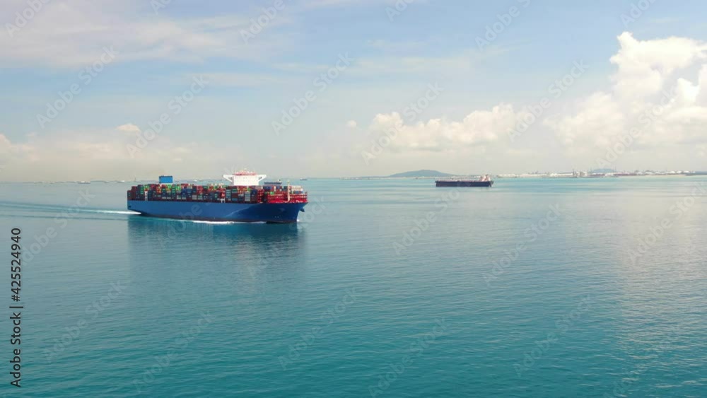 A large container ship for transporting goods near the port of ...