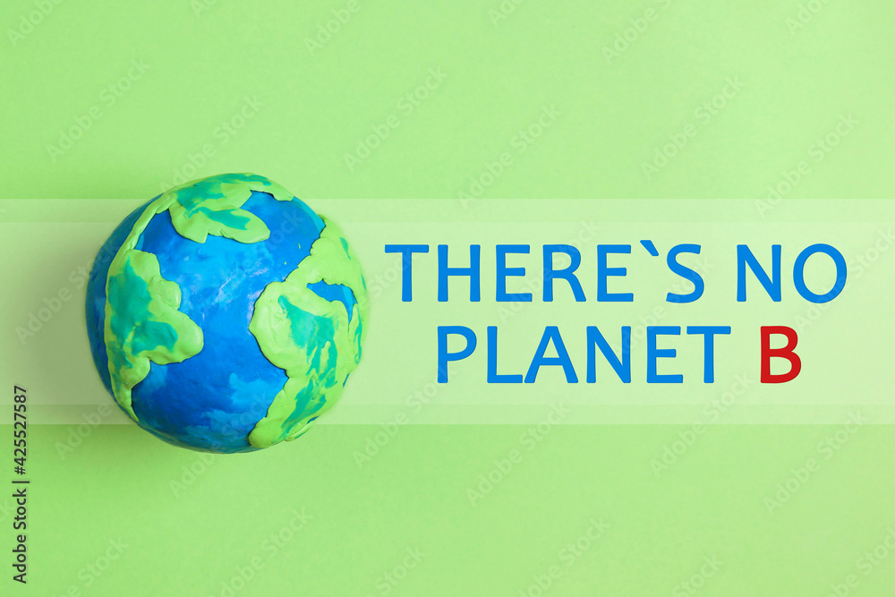 Ecological concept with globe on a green background and text. There is ...