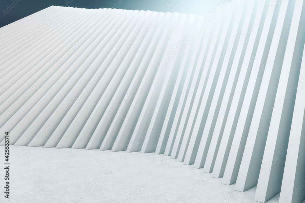 Abstract diagonal white concrete wall made of multiple columns in an ...